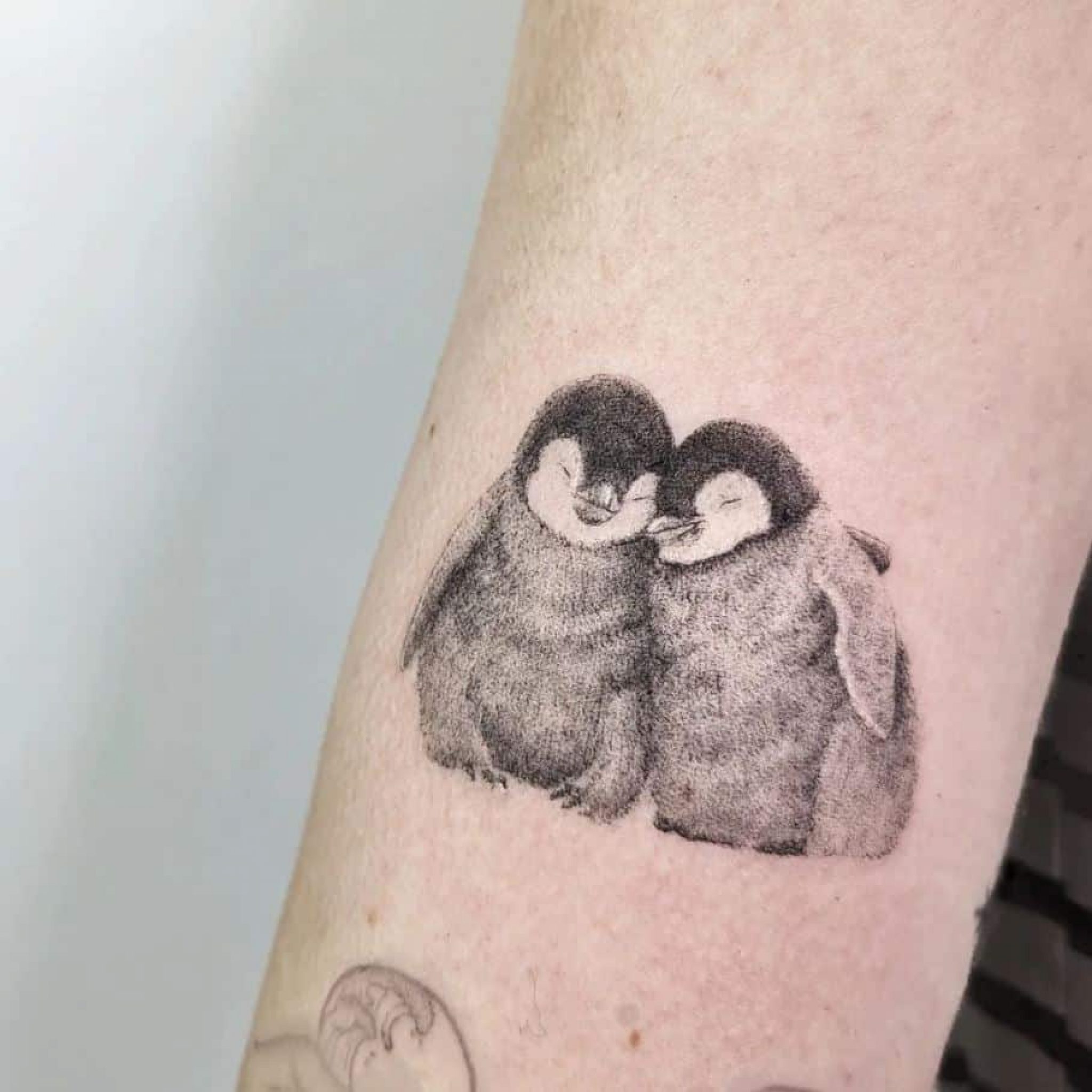 30 Pinguin Tattoo Ideen, die ungewöhnlich liebenswert sind